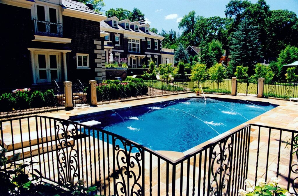 24 Durable And Beautiful Wrought Iron Fences and Gates - InteriorSherpa